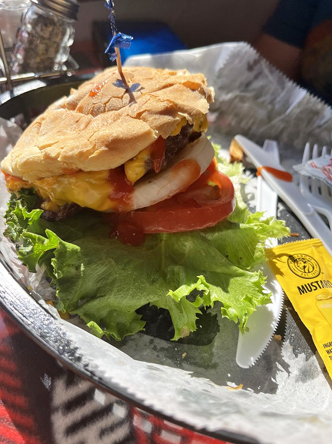 This isn't just a cheeseburger&mdash;it's a towering monument to beef perfection that requires strategic bite planning and zero shame.