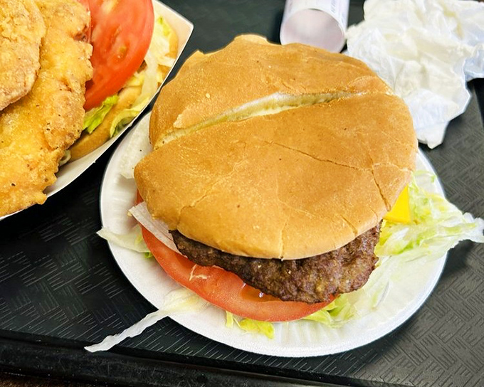 Simple perfection on a paper plate. This no-frills cheeseburger doesn't need fancy aioli or artisanal buns to make your taste buds stand at attention.