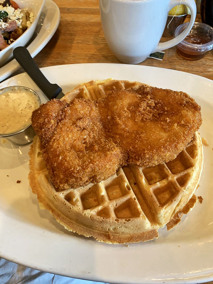 Chicken and waffles: where Southern comfort meets Midwest hospitality. That golden-brown crust is the breakfast equivalent of a standing ovation.