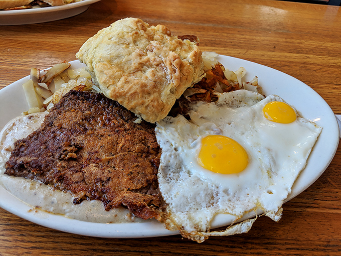 Chicken fried steak with sunny-side-up eggs and a biscuit&mdash;the holy trinity of diner breakfasts. Crispy, savory, and unapologetically indulgent. 