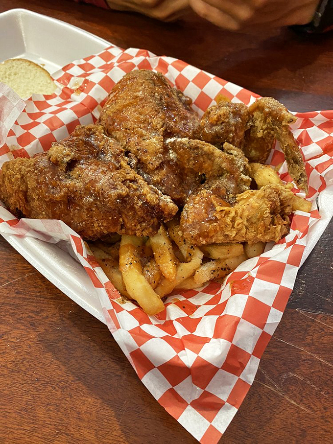 Golden-brown perfection nestled on a bed of fries. That sauce-soaked masterpiece isn't just chicken&mdash;it's Chicago culture served in a paper basket.