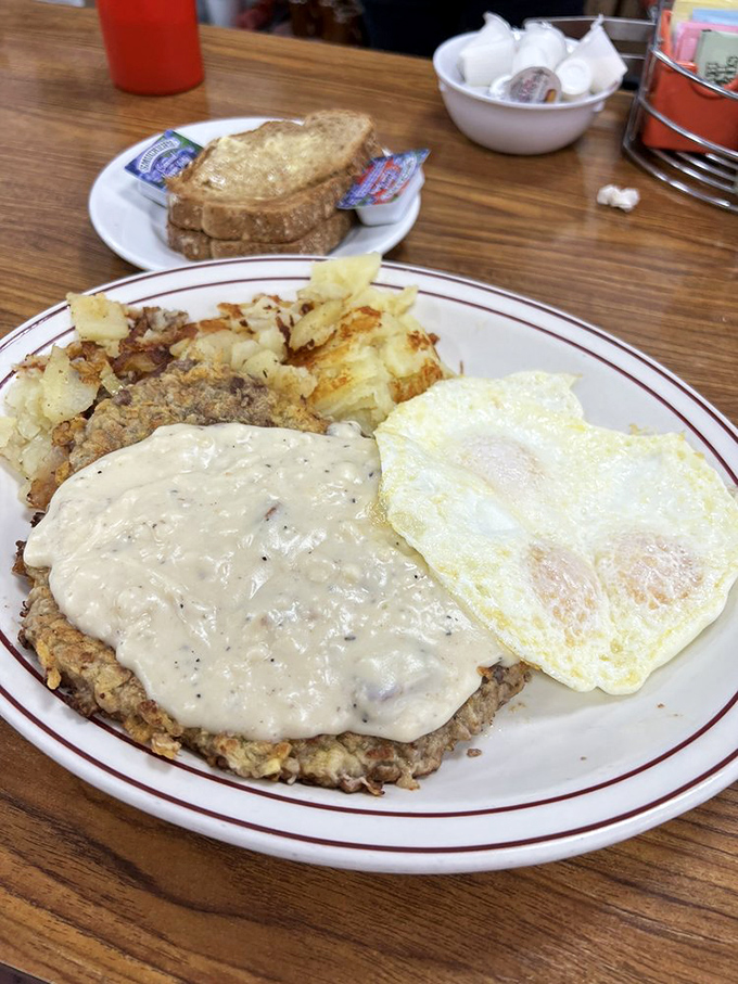 Behold, the holy grail of diner cuisine: chicken fried steak swimming in peppery gravy with eggs and potatoes. Calories don't count when they're this delicious.