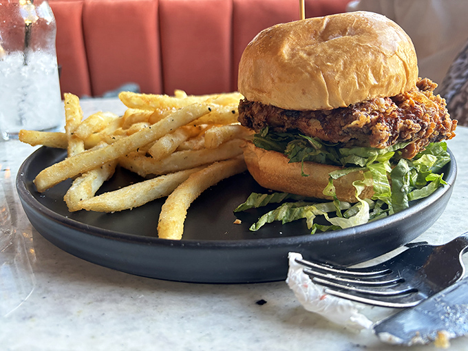 A sandwich that means business&mdash;golden-crisp fries alongside a towering chicken creation that makes you wonder why you ever settled for drive-thru mediocrity.