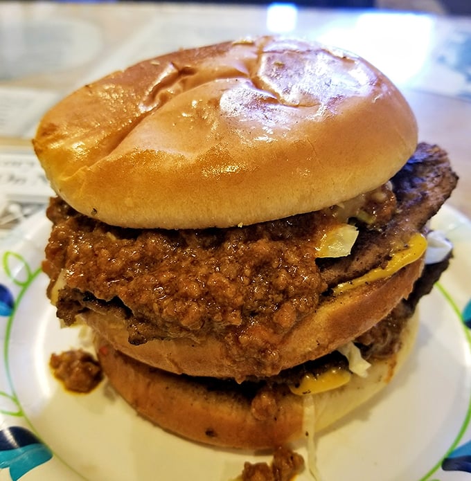 Not just any cheeseburger&mdash;this towering chili-drenched masterpiece requires strategic eating, multiple napkins, and absolutely zero first-date situations.