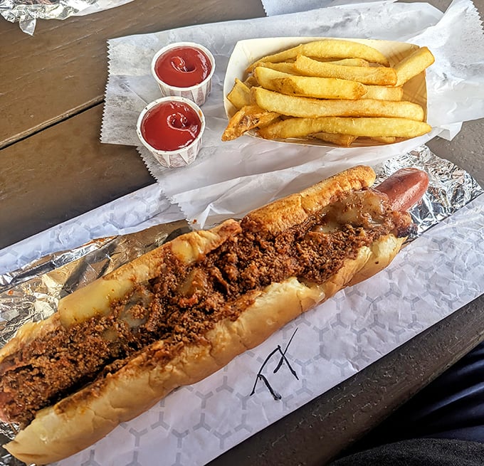 Behold the chili dog in its natural habitat &ndash; gloriously messy, unapologetically delicious, and worth every napkin you'll need afterward.