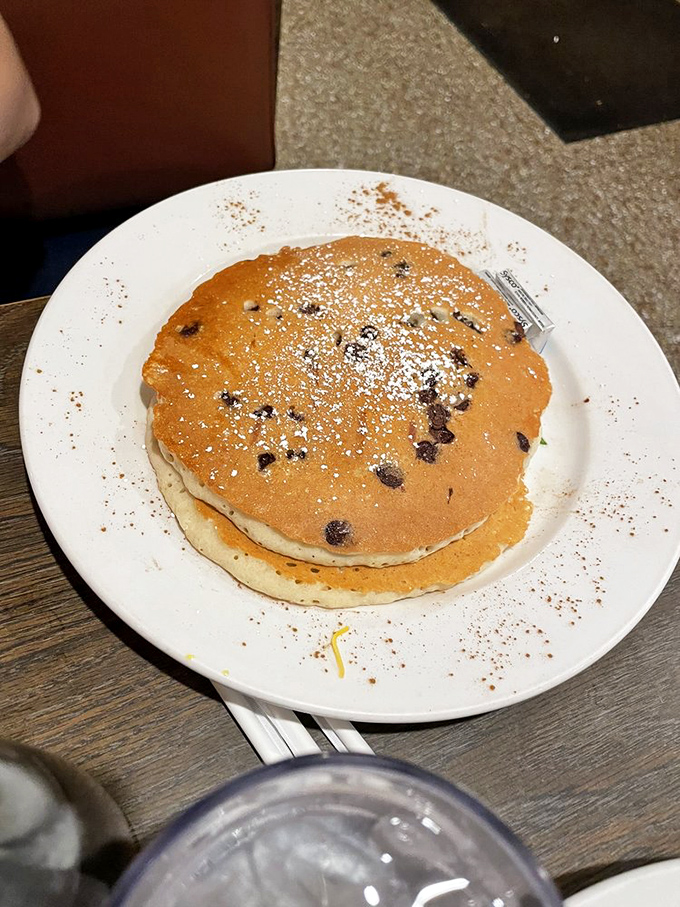 These chocolate chip pancakes aren't just breakfast&mdash;they're an edible hug, dusted with powdered sugar and sprinkled with possibility.