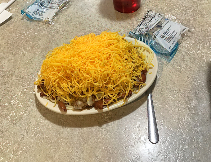 Cincinnati's famous 5-way chili in its natural habitat&mdash;a mountain of finely shredded cheddar that's practically begging you to dive in face-first.