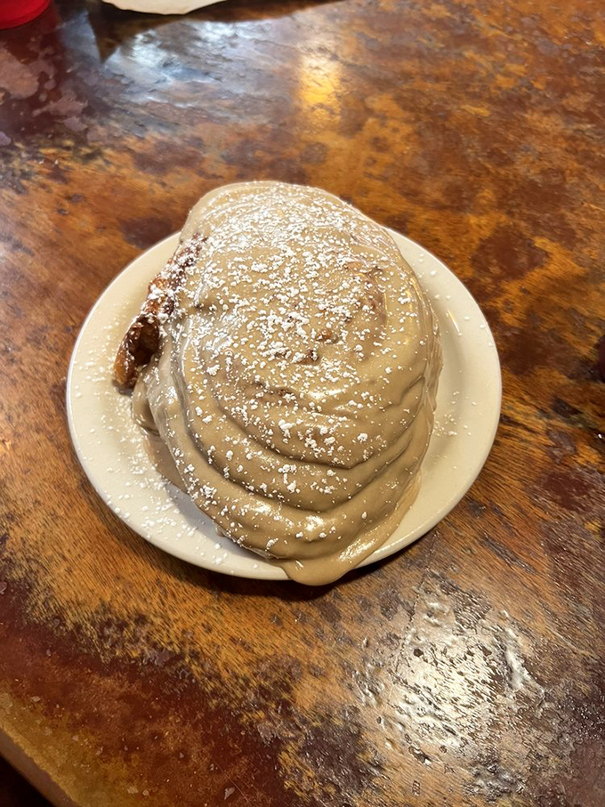 Not all heroes wear capes. Some wear cinnamon and powdered sugar and arrive on a small white plate to save your morning.