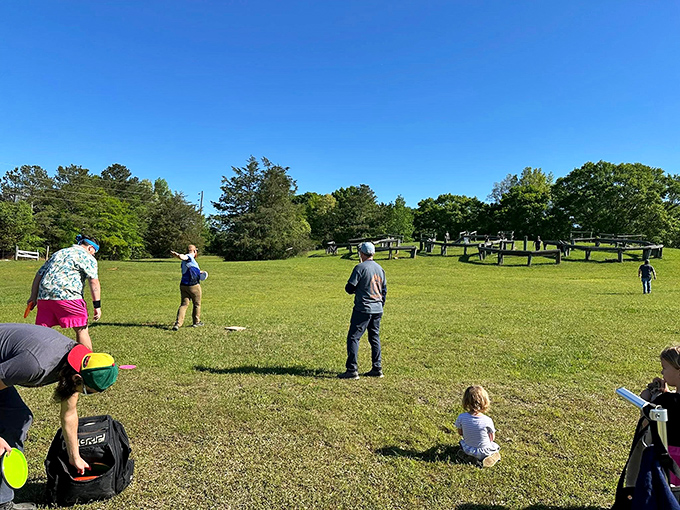 Nothing says "community" like adults willingly lying on grass to play frisbee. In Conyers, people actually use their parks instead of just posting about them.