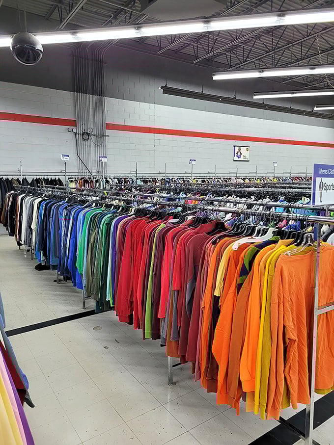 A rainbow of possibilities hangs in perfect order. The clothing section is organized by color, creating a visual feast that would make Marie Kondo proud.