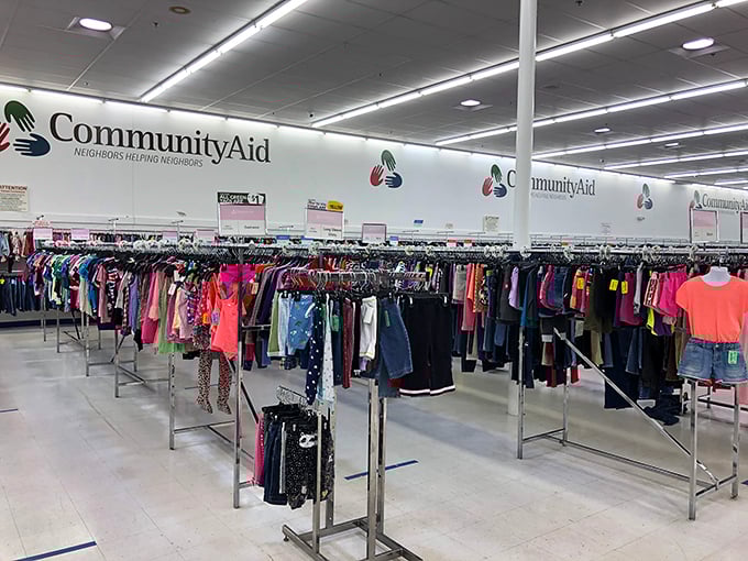 Meticulously organized clothing racks create a rainbow effect that's both practical and oddly satisfying for the dedicated bargain hunter.