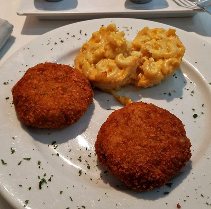 Golden-brown perfection meets mac and cheese soulmate. These crab cakes contain more actual crab than most seafood restaurants' entire freezer.