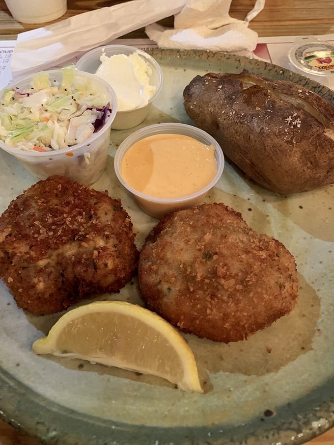 Golden-brown discs of joy that contain more crab than filler, these legendary crab cakes are what seafood dreams are made of.
