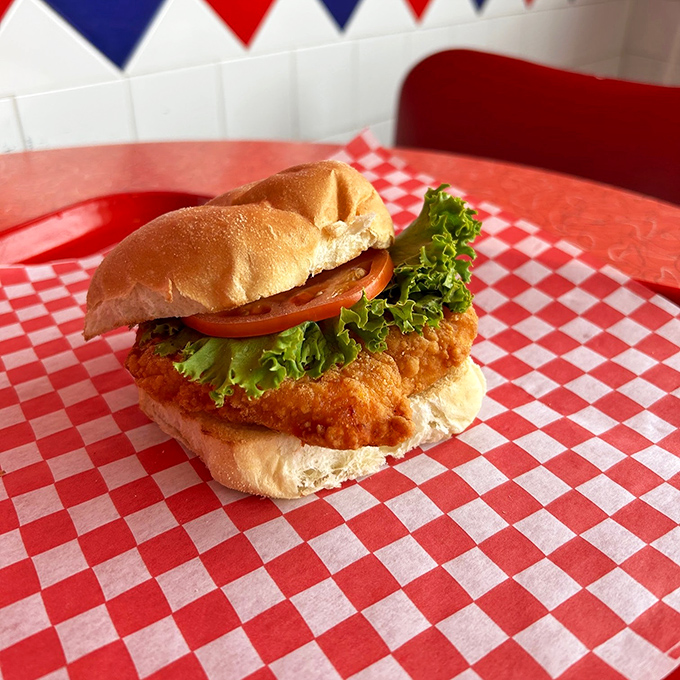 This crispy chicken sandwich doesn't just talk the talk&mdash;it walks the crunch. Golden-brown perfection nestled in a soft bun with fresh lettuce and tomato.