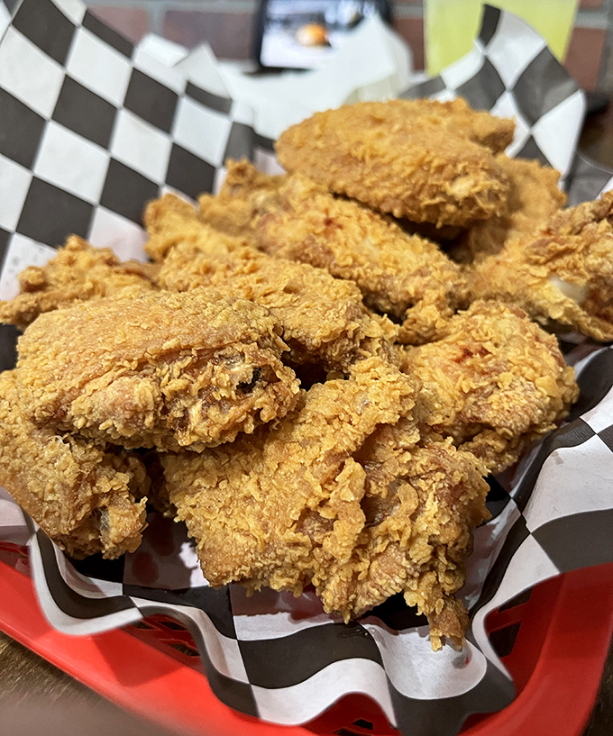Golden-brown perfection in a checkered basket &ndash; this crispy chicken has the kind of audible crunch that turns heads three tables away.