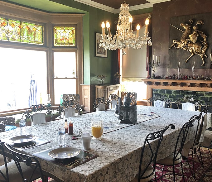 Breakfast fit for nobility served beneath crystal chandeliers&mdash;the green walls and ornate woodwork transport you to another era entirely.