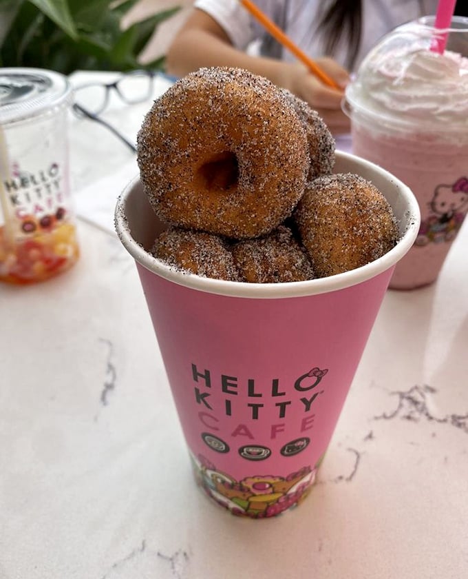 Cinnamon-sugar donuts that would make Homer Simpson weep with joy, served in a cup that reminds you calories don't count when they're this cute.