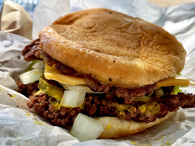 Behold the double cheeseburger with jalape&ntilde;os&mdash;where beef meets heat in a romance that would make Shakespeare weep with joy.