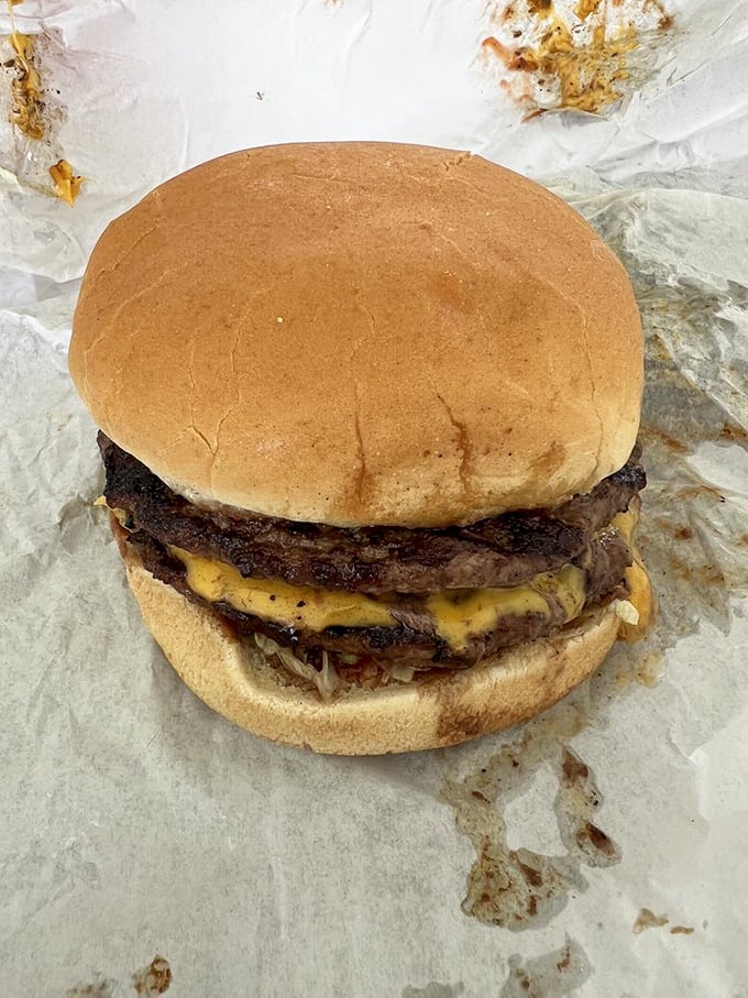 This double cheeseburger isn't trying to impress your Instagram followers &ndash; it's too busy preparing to impress your taste buds.