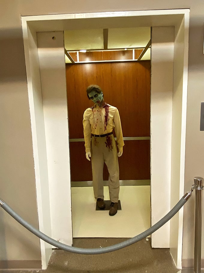 This eerie elevator display recreates a classic zombie encounter scene&mdash;thankfully, this undead passenger stays put when the doors open.