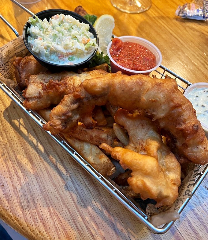 Golden-battered fish and chips that would make a British pub jealous. That perfect crunch gives way to flaky white fish&mdash;seafood nirvana in a basket.