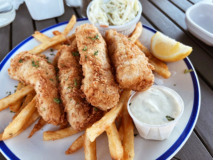 Golden, crispy perfection on a plate. This fish and chips isn't just a meal, it's the reason locals set their GPS to Lewes when cravings strike.