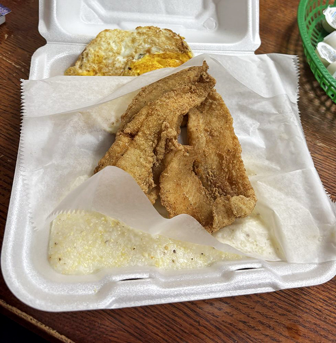 Fried fish for breakfast? In the South, that's not rebellion&mdash;it's tradition. Crispy, golden perfection paired with creamy grits creates morning magic.