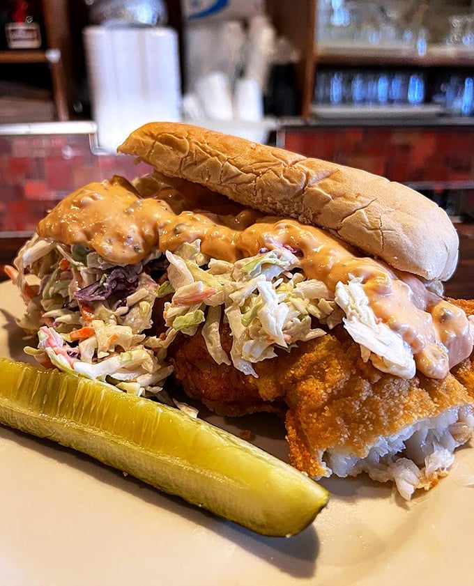 The legendary fish sandwich in all its glory&mdash;where crispy breaded cod, creamy coleslaw, and sauce create a holy trinity of flavor that's worth crossing state lines for.