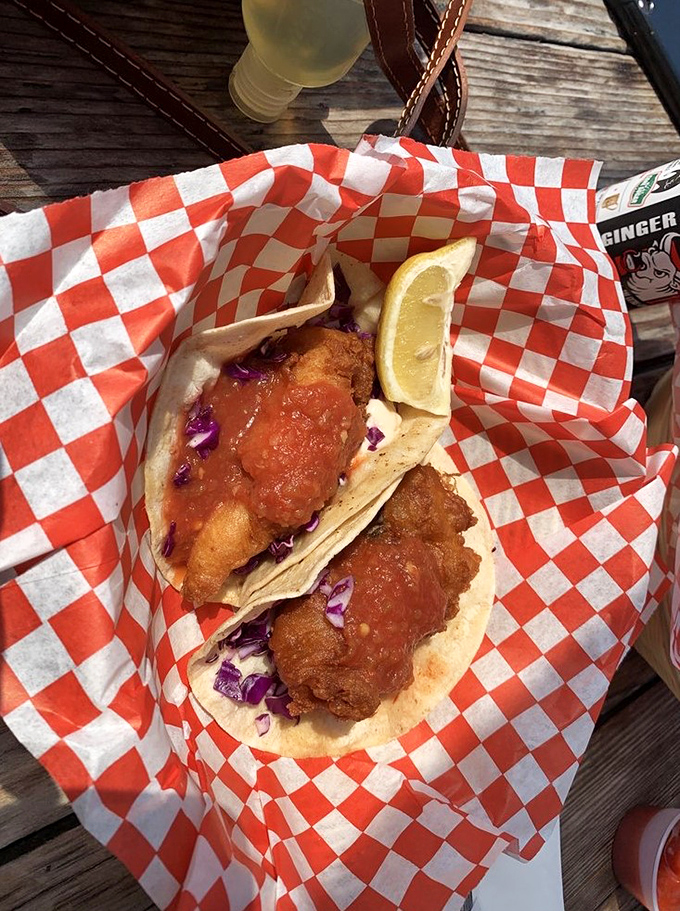 These fish tacos aren't trying to win beauty contests&mdash;they're too busy delivering crispy, tender perfection wrapped in simple tortillas with just the right toppings.