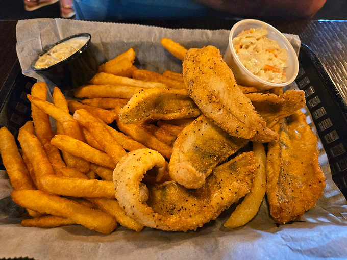 Golden, crispy perfection that would make a British pub jealous. The fish practically high-fives your taste buds while the fries stand at attention.