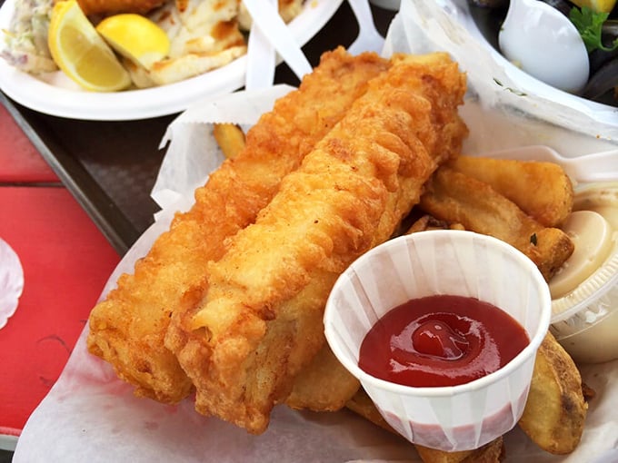 Golden-battered fish that shatters with each bite, paired with chips that could make a British pub jealous. Ocean-to-plate perfection.