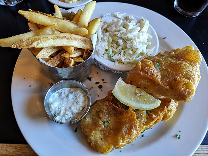 Golden-battered haddock that shatters with each bite, alongside hand-cut fries that deserve their own fan club.
