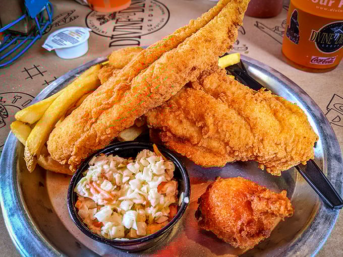 Golden-fried flounder that shatters like glass when your fork hits it, paired with crispy fries and creamy slaw&mdash;the holy trinity of coastal comfort.