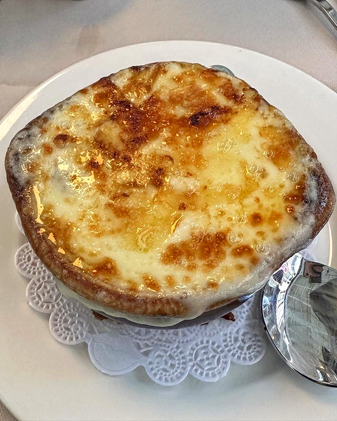This French onion soup isn't just a dish&mdash;it's an event. The cheese pull alone deserves its own standing ovation.