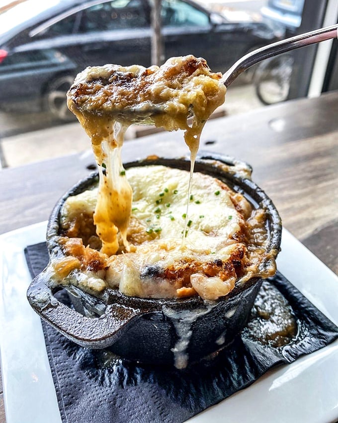 The French onion soup that dreams are made of. That cheese pull isn't just Instagram-worthy&mdash;it's a religious experience that transforms ordinary soup into extraordinary memories.