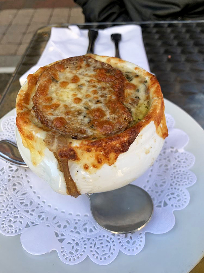 Behold the crown jewel &ndash; a bubbling masterpiece of caramelized onions and molten cheese that makes all other soups feel like they're not even trying.