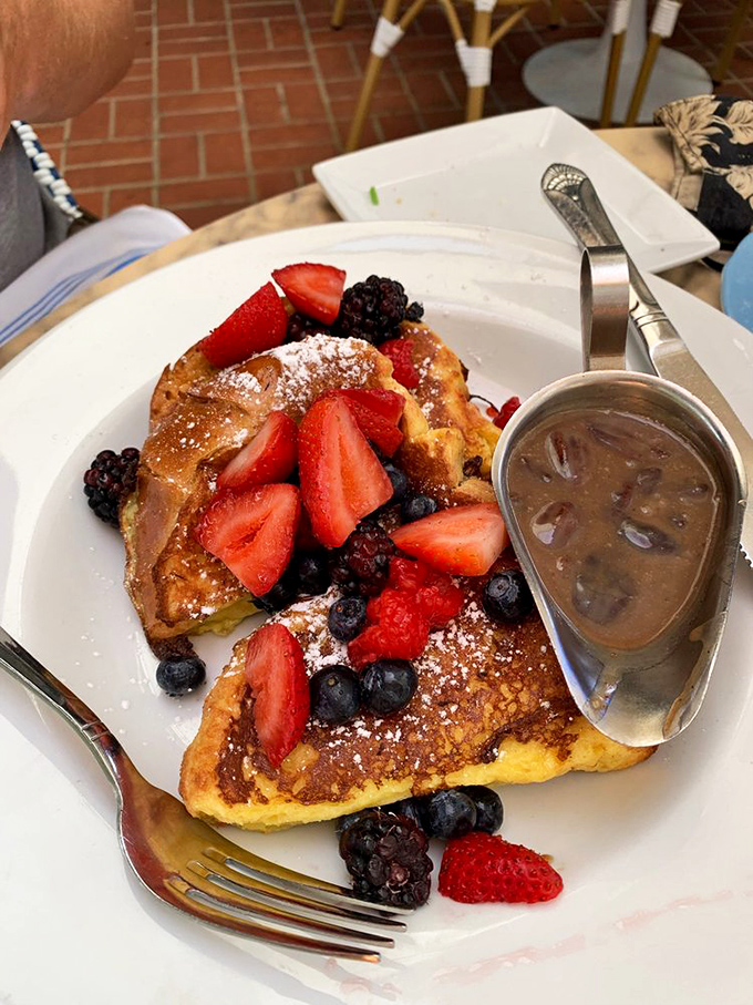 French toast nirvana achieved! Golden brioche adorned with fresh berries and a side of maple goodness. Breakfast doesn't get more photogenic than this.