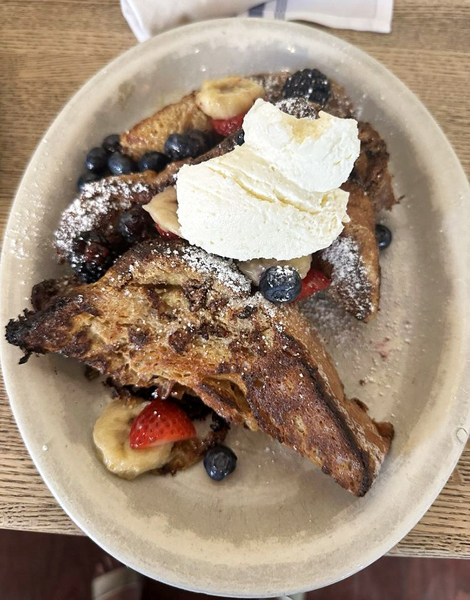 Behold, the French toast that launched this article. Fresh berries, whipped cream, and bread transformed into something divine.