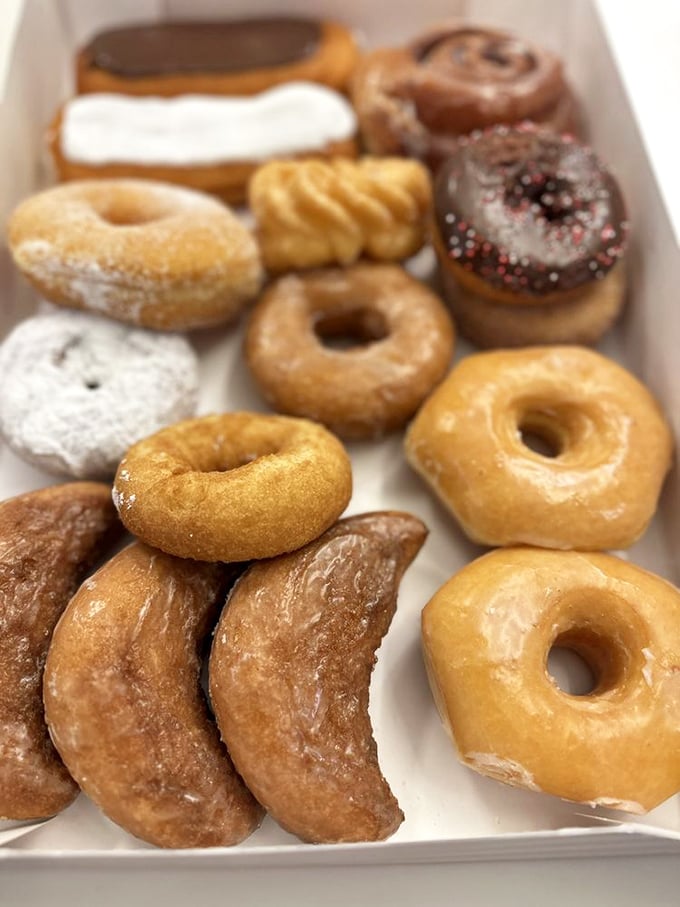 A box of pure dopamine &ndash; each donut promising the kind of happiness that not even the best therapist could provide.