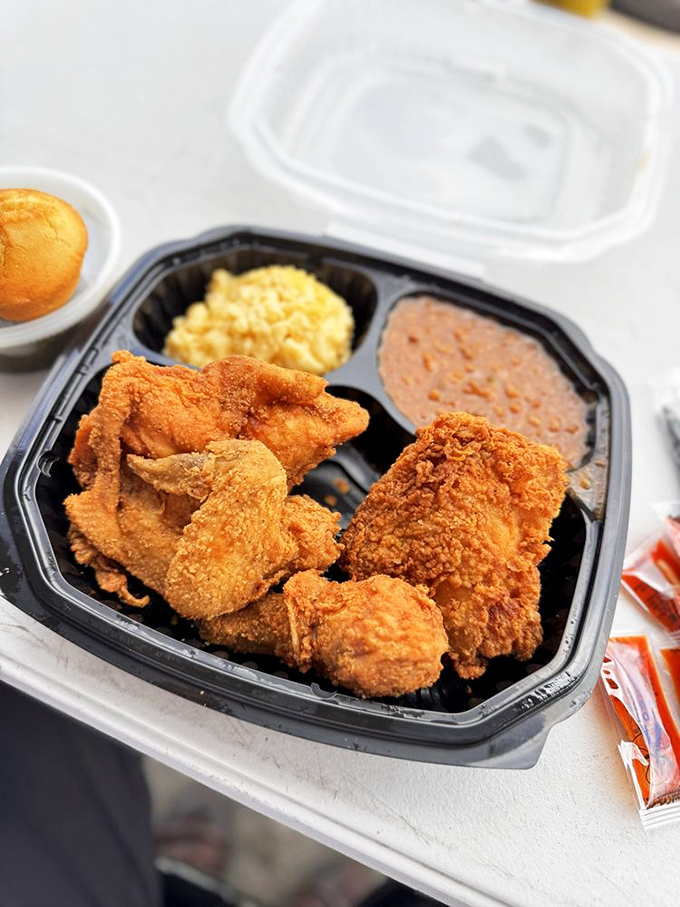 Golden-brown perfection that makes Colonel Sanders look like an amateur. The mac and cheese and beans aren't sides&mdash;they're worthy companions on this flavor journey.