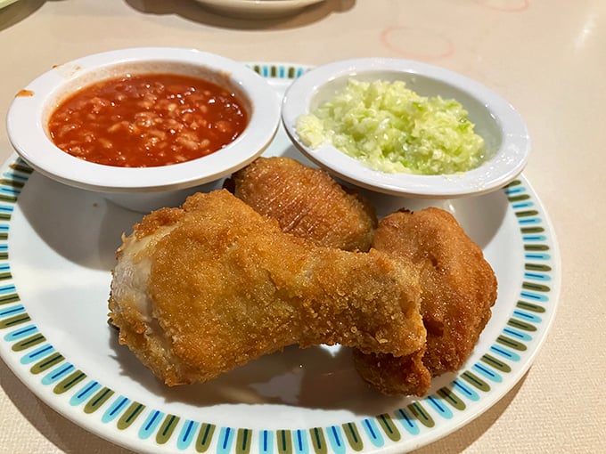 Golden-brown perfection that makes you forget your table manners. This chicken doesn't need fancy plating&mdash;it's the Meryl Streep of fried poultry, consistently excellent.