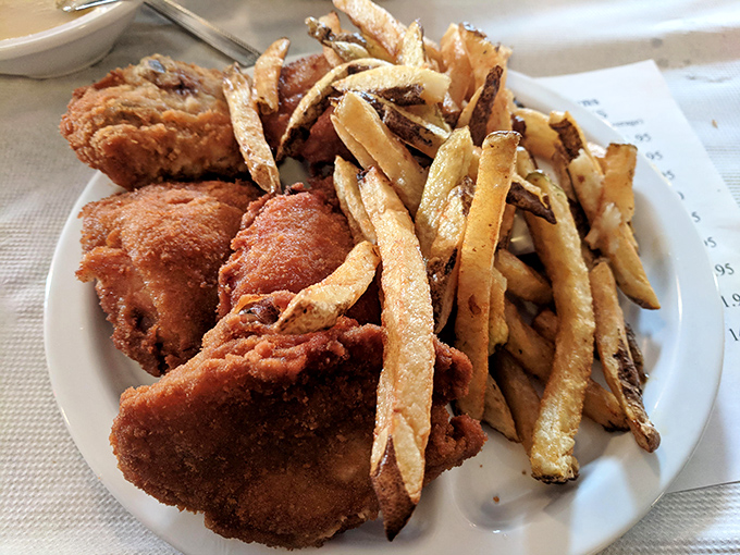 Golden-brown perfection doesn't happen by accident. This chicken and those hand-cut fries are what food dreams are made of.