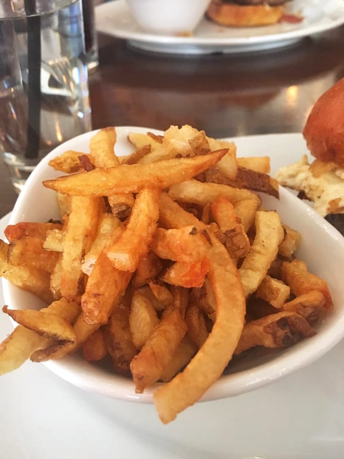 Golden, crispy perfection in a bowl. These fries aren't merely a side dish&mdash;they're the supporting actor that steals the show.