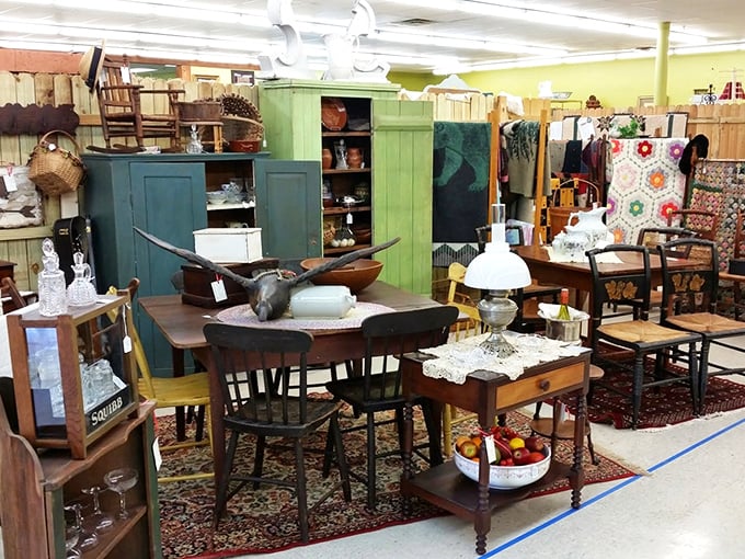 Country charm meets functional history in this rustic display. That braided rug has probably witnessed more family dinners than your grandmother's photo album.