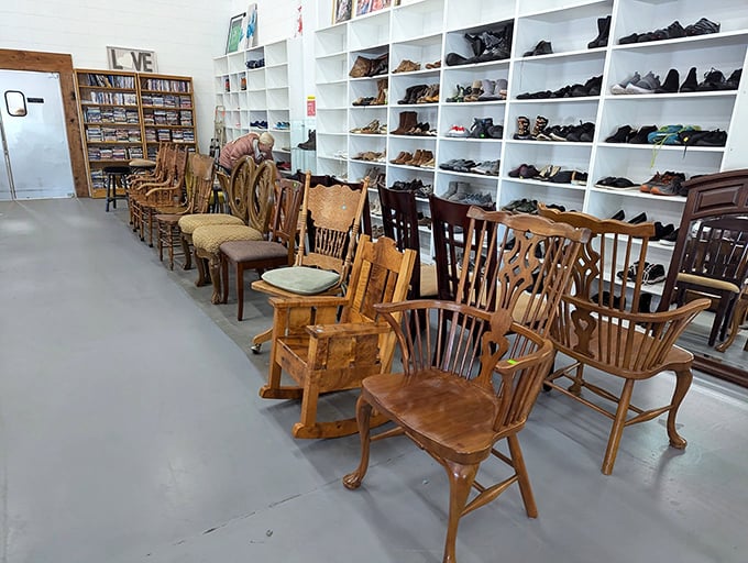 Wooden chairs with stories to tell line up like eager contestants on a talent show, each hoping to find their forever home.