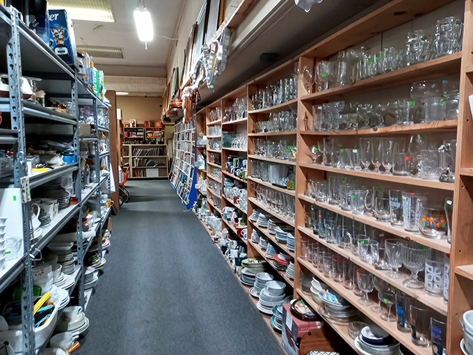 Glassware heaven! Each shelf holds potential heirlooms that might have graced your grandmother's table during those legendary Sunday dinners.