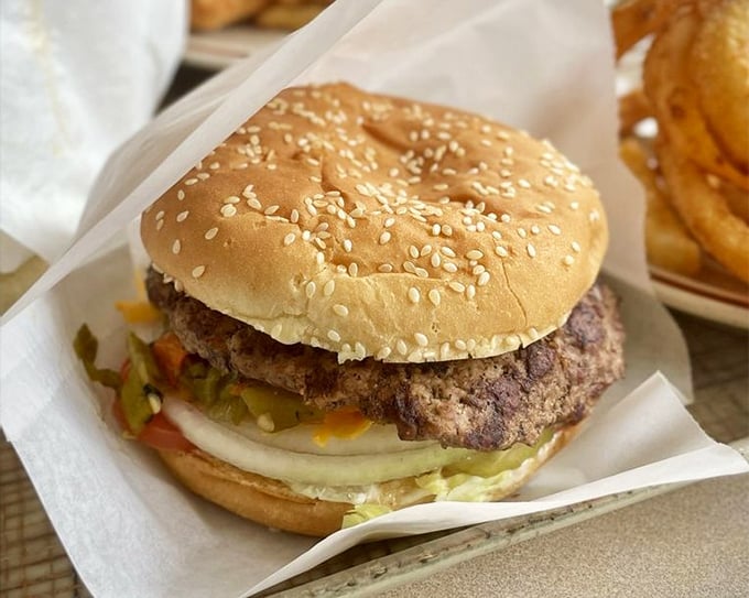 Not all heroes wear capes; some come on sesame seed buns with perfectly melted cheese and a patty that's worth crossing state lines for.