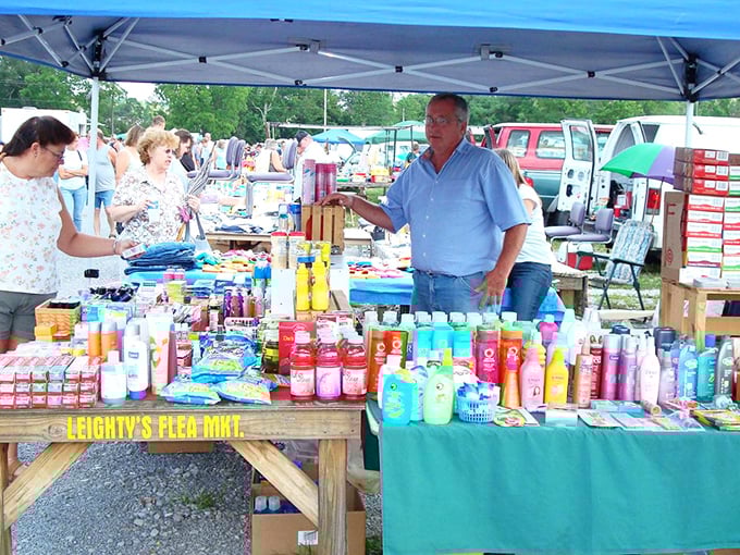 Everyday essentials transformed into a rainbow of possibility. This vendor knows presentation is everything in the competitive world of flea market merchandising.