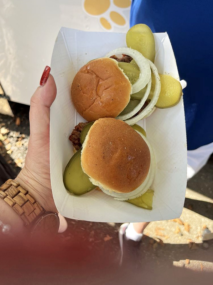 Pickle lovers rejoice! These perfectly proportioned burgers come adorned with tangy dill slices that cut through the richness like old friends reuniting.