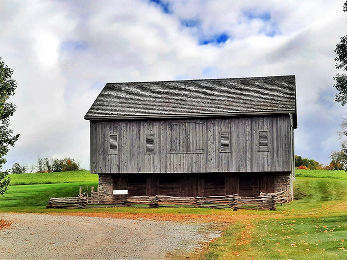 Weathered wooden barns dot the Holmes County landscape, silent storytellers of generations of Amish craftsmanship and agricultural tradition.